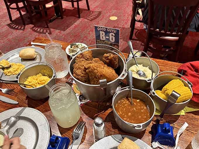 Fried chicken, mashed potatoes, corn, baked beans, and mac and cheese, all served in satisfying little pots.