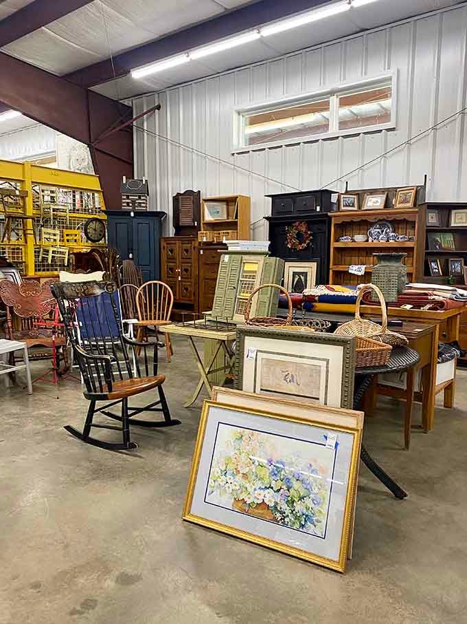 Furniture with character stacked high, each piece whispering tales of the homes it once called its own.