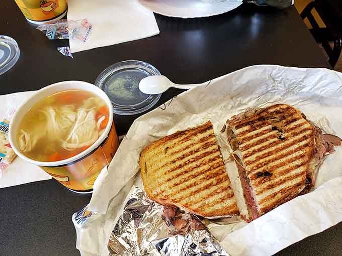 Soup and a perfectly pressed panini sharing the same table. This is the kind of meal that makes you cancel your afternoon plans.
