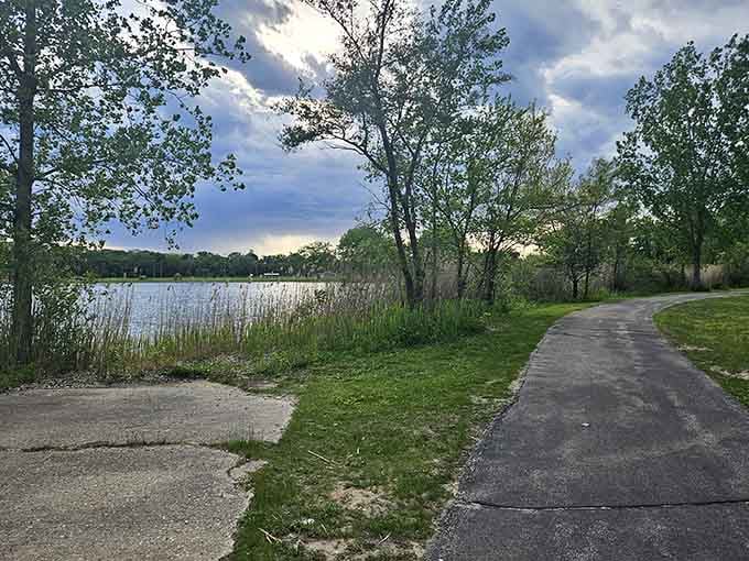 Paved paths wind along the shoreline, perfect for strollers, walkers, and anyone avoiding actual hiking.