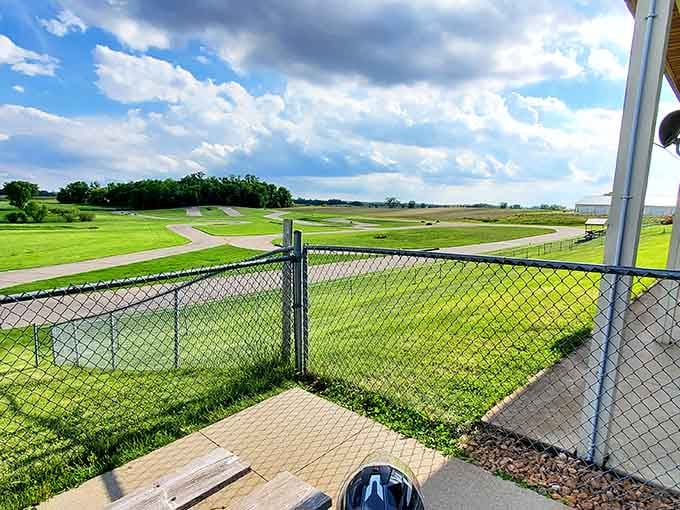 A lone helmet sits waiting by the gate, as if it already knows something thrilling is about to happen.