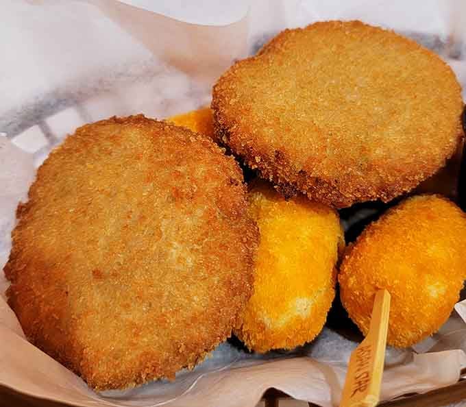 A basket of crab cakes so perfectly golden, you'd think the fryer was showing off just for you.