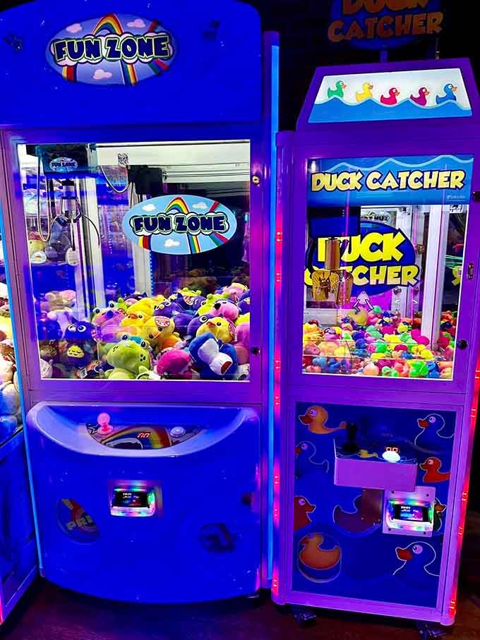 Claw machines packed with plush toys and rubber ducks, because hope springs eternal and so does the urge to try again.