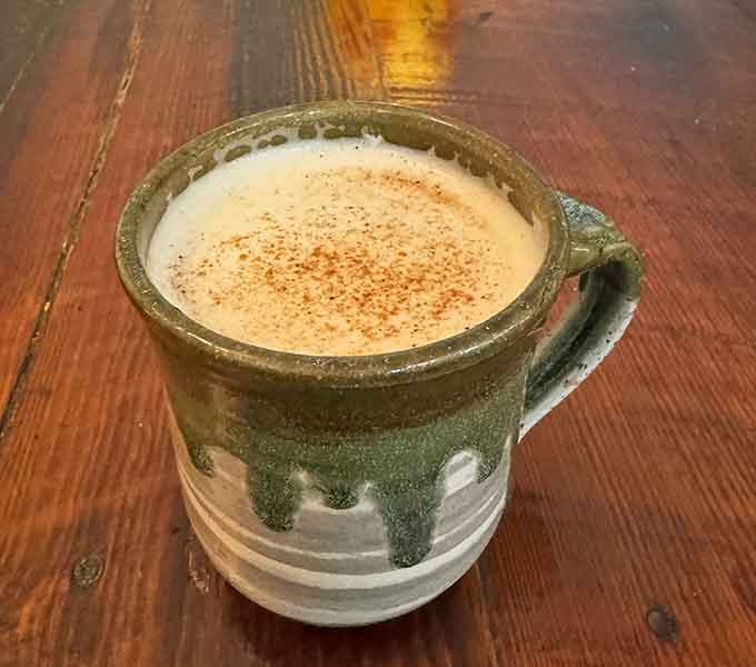 Served in a handmade ceramic mug, this warm chai is the kind of drink that makes you forget your to-do list entirely.