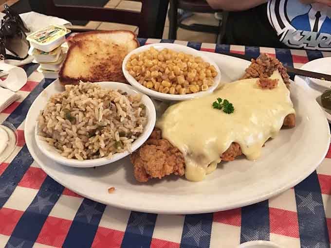 Cream gravy, T-Bone Tom's Rice, and sweet corn on the side. This plate is a full Texas education on one dish.