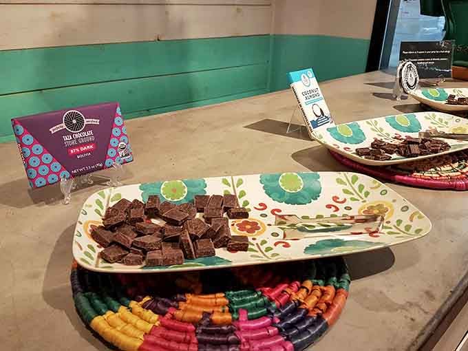 Generous sample platters of stone ground dark chocolate, including an 87% dark Bolivia bar, await your attention.