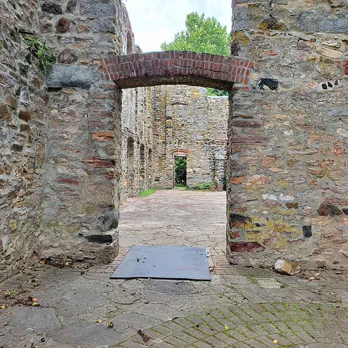 A brick archway so perfectly framed it makes every other doorway you've ever walked through feel inadequate.