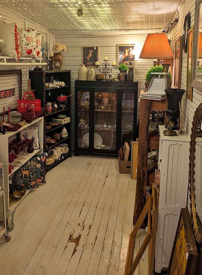 Fairy lights overhead, antique cabinets below, and enough character in this room to fill a novel.