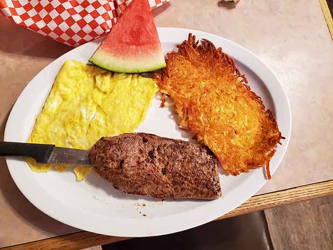 That hash brown patty is golden perfection, and the steak means business before your day even starts.