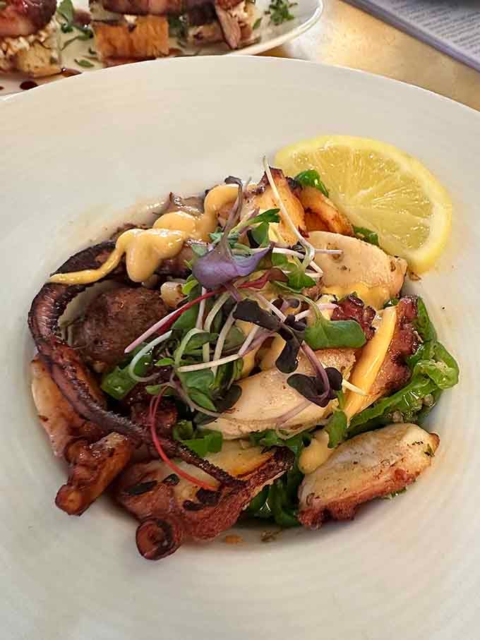 Grilled octopus with fresno aioli and microgreens, proof that the sea has very good taste.