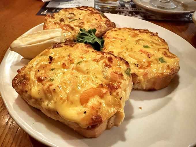 Seafood melt topped with bubbling cheese, because sometimes the Midwest does coastal cuisine with its own delicious twist.