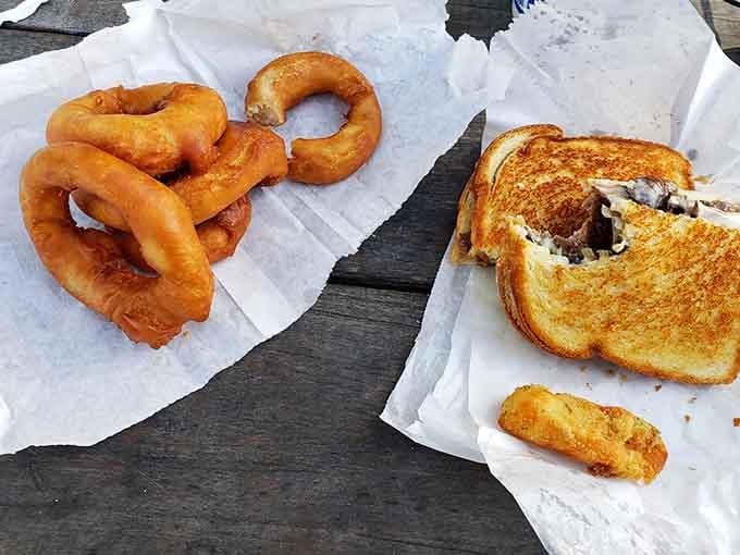 Onion rings with serious backbone alongside a Patty Melt that means business. This is a proper roadside spread.