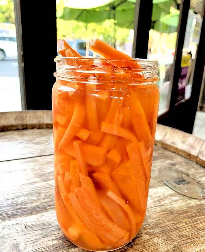 Pickled carrots so vibrant and colorful, they make every other vegetable in your fridge feel deeply embarrassed.