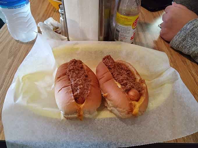 Two perfect specimens of hot dog engineering, simple and devastatingly delicious in their steamed buns.