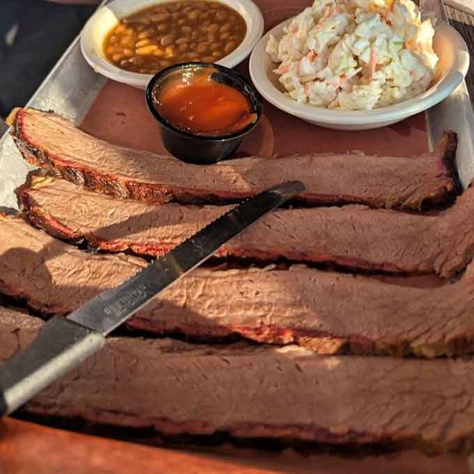 Sliced brisket with a smoke ring that would make any pitmaster nod slowly in quiet, respectful approval.