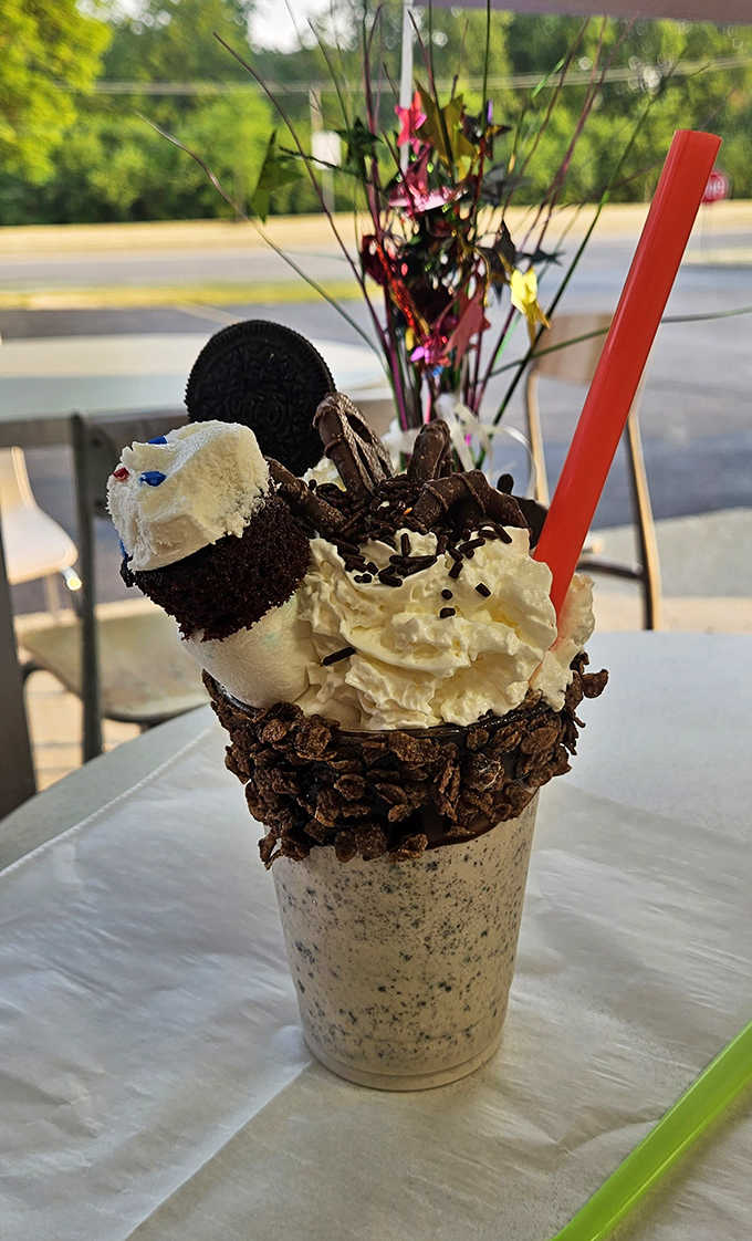 Oreo cookies, whipped cream, chocolate sprinkles, and enough toppings to make your eyes go wide before your spoon even moves.