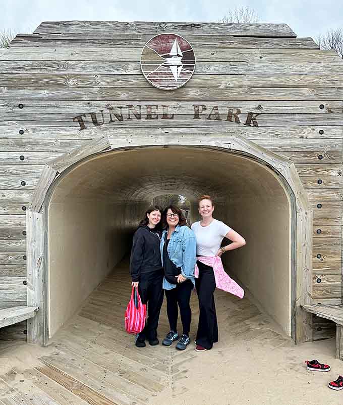 The tunnel makes for perfect photo ops, capturing that moment before the beach adventure officially begins.