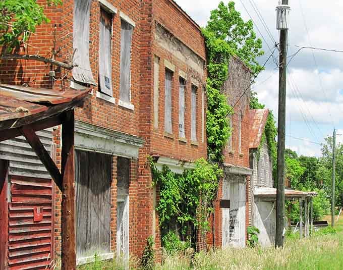 Nature's patient reclamation project continues as ivy climbs walls that once rang with customers' voices and laughter.