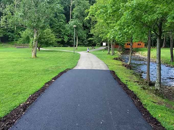 Peaceful walking path alongside babbling water, nature's original white noise machine for clearing your mind completely.