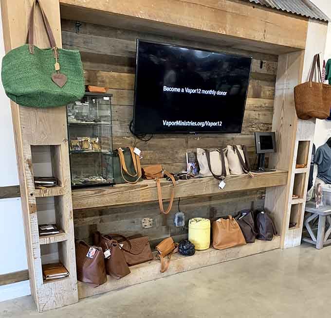 Handbags displayed on rustic wood shelving, because even your accessories deserve a second chance at glamorous life.