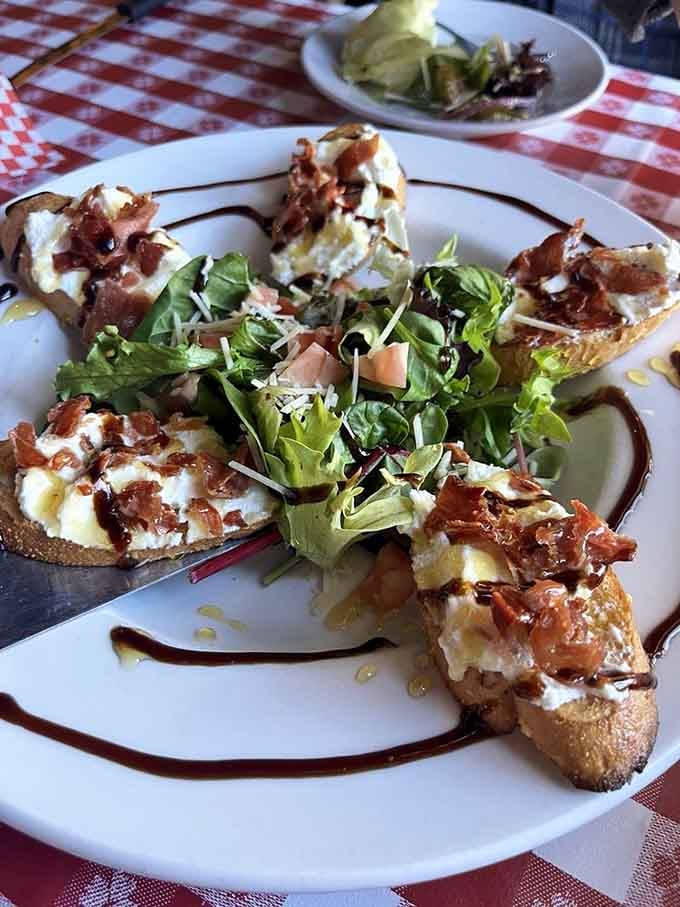 Bruschetta topped with ricotta and prosciutto—because sometimes simple ingredients create the most memorable moments.