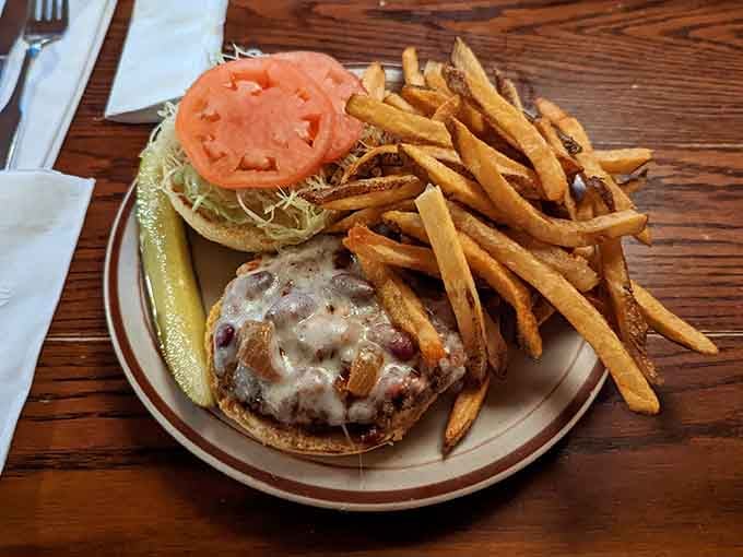 Wag's chili piled high on a fresh burger with melted cheese, proof that two great things are better together than apart.