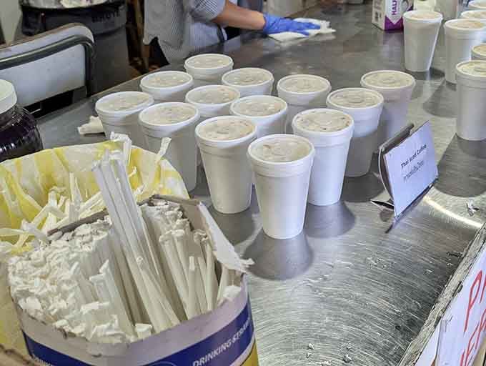Rows of Thai iced coffee lined up and ready &mdash; your morning just got a serious upgrade.