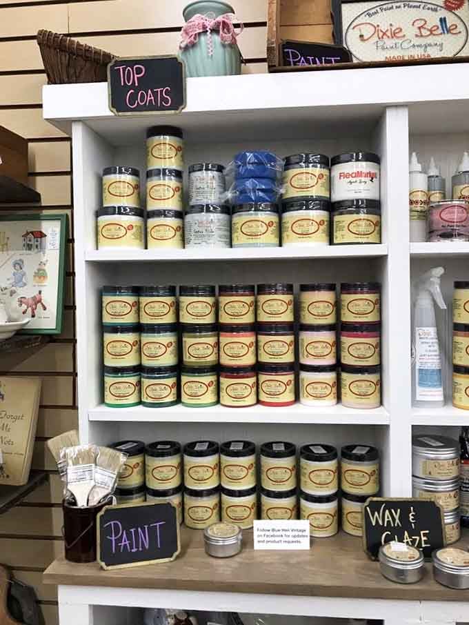 Dixie Belle mineral paints stacked neatly, ready to transform that tired old dresser into something genuinely beautiful.
