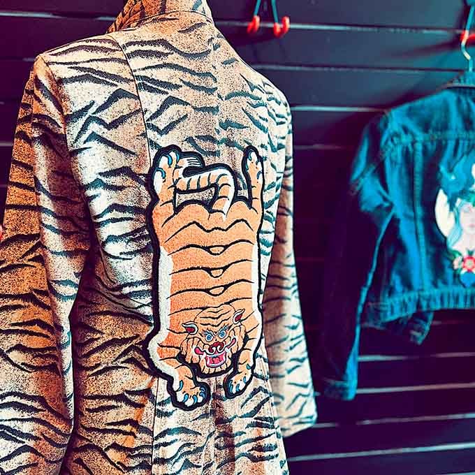 A tiger-print jacket that makes every other jacket you own feel deeply embarrassed about itself.