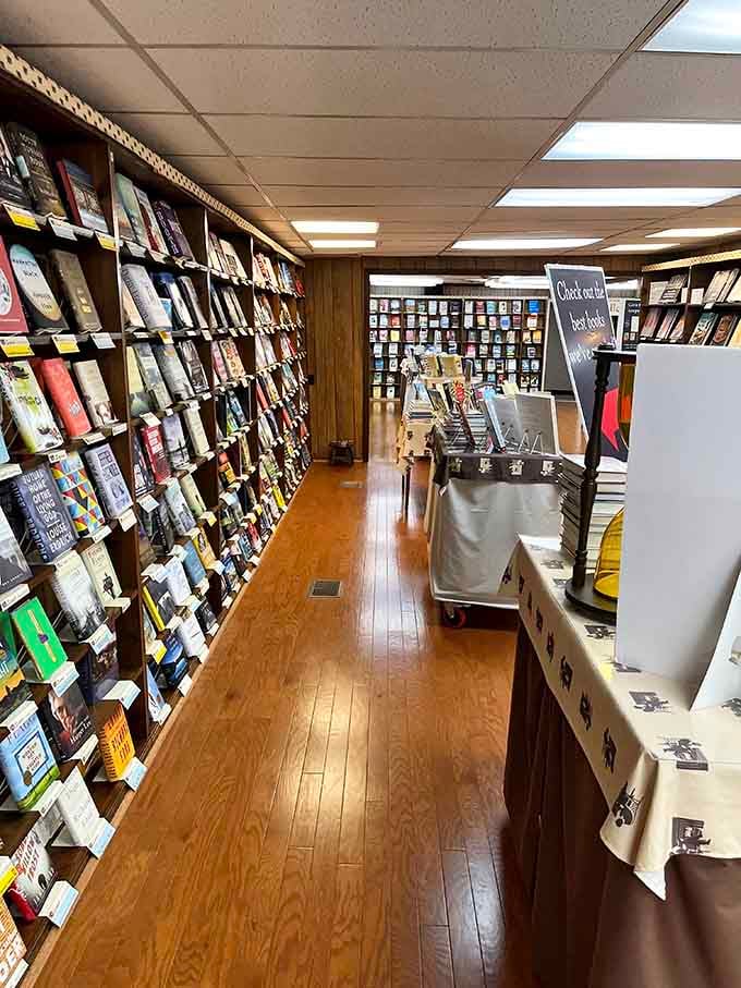 Row after row of signed books line these cozy shelves, each one carrying an author's personal touch.