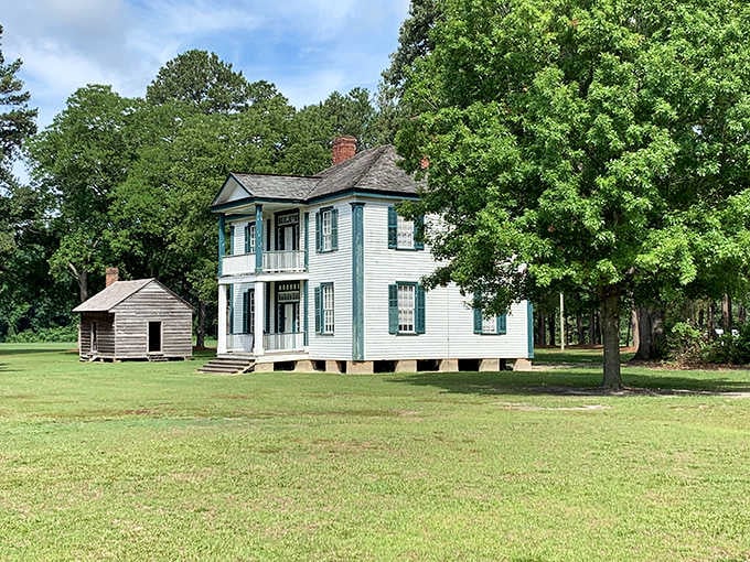 The Harper House stands quietly on its wide green lawn, carrying the weight of Civil War history in every white-painted board.