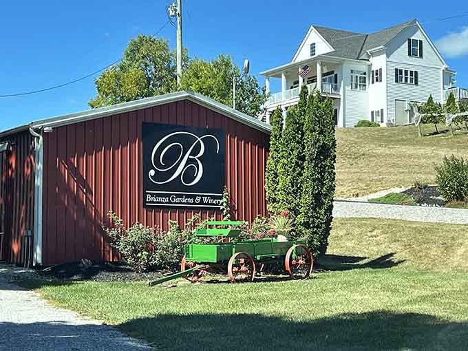A bright green vintage wagon overflowing with flowers sits proudly out front, setting a cheerful tone before you've even stepped inside.