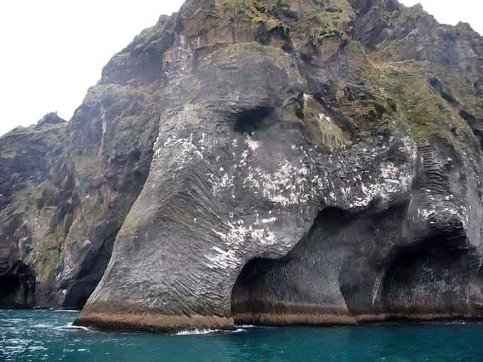 These massive granite formations rising from the water could pass for ancient sculptures&mdash;nature's own art gallery.