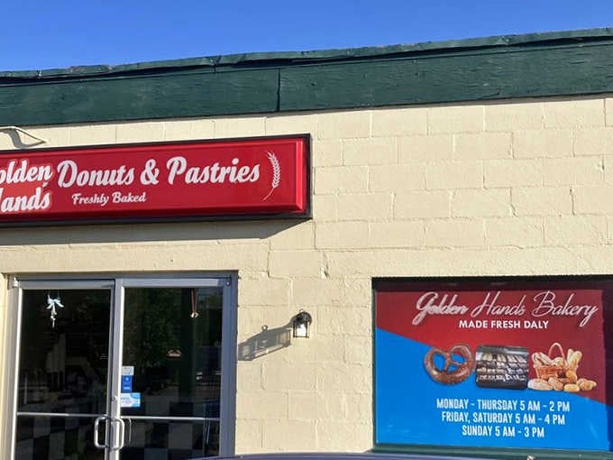 That bright red "Freshly Baked" sign against the morning sky is basically an alarm clock you actually want to hear.