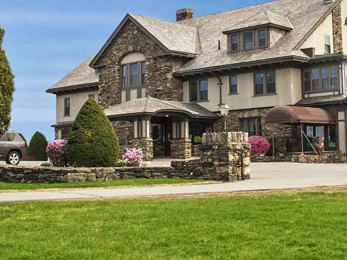 Pink azaleas blooming against that grand stone mansion make Hebert Candies look less like a candy shop and more like a fairy tale.