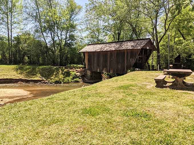 Sunlit grass and weathered wood create a pastoral scene that makes you want to pack a picnic and stay awhile.