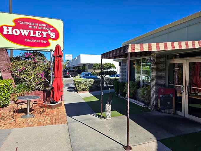 That cheerful red-and-yellow Howley's sign has been guiding hungry locals to great food since 1950.