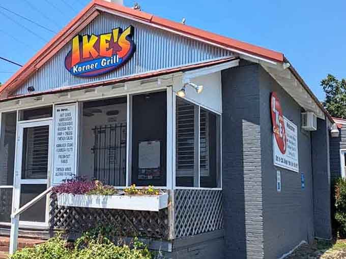 That bold, colorful sign perched above the screened porch makes Ike's Korner Grille impossible to miss on a bright Spartanburg afternoon.