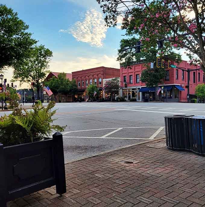 That spectacular cloud formation above historic buildings looks like nature's own cotton candy floating across a perfect evening sky.