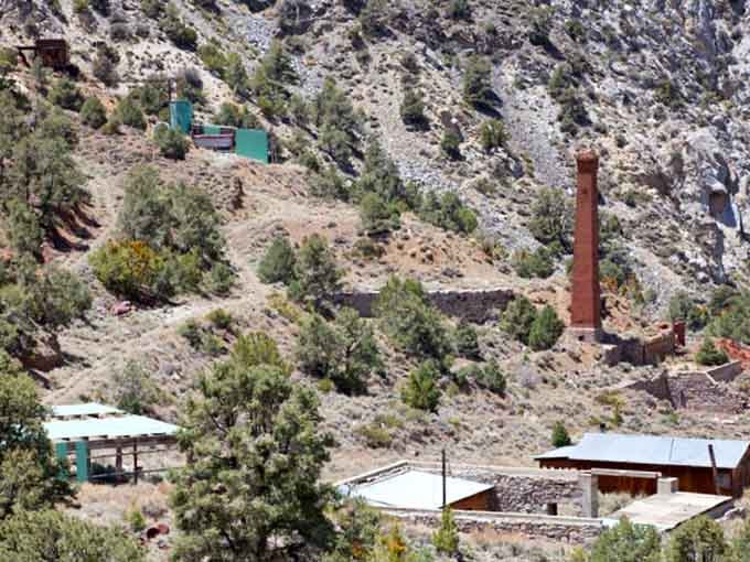 That tall brick smokestack rising from the canyon hillside is the exclamation point on a century of hard labor.