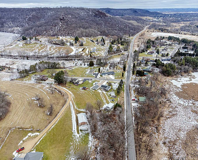 From up high, Pinecreek's rolling hills and winding roads look like a painting someone forgot to put in a museum.