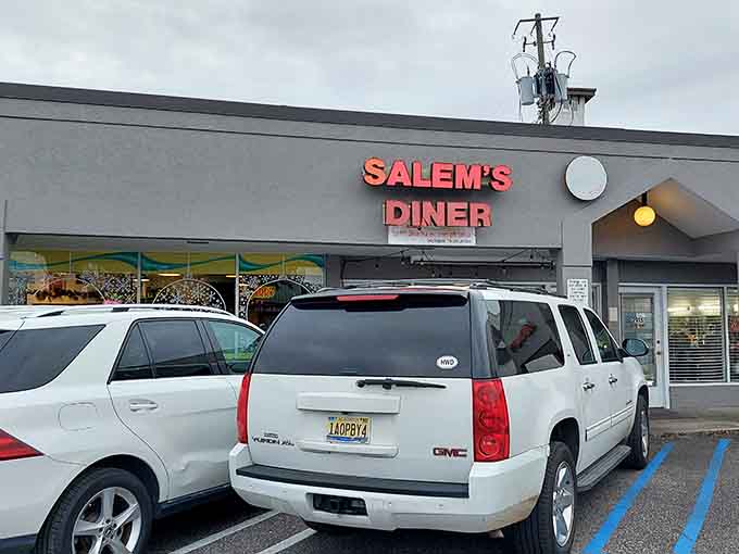 Salem's glowing sign cuts right through a gray Birmingham afternoon like a warm, reliable old friend.