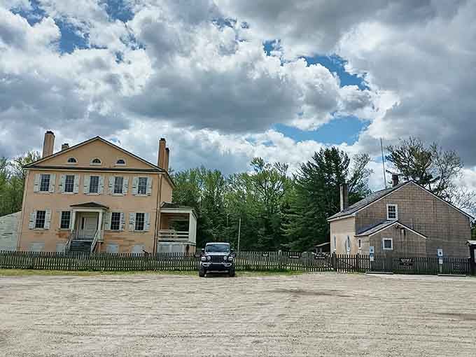 Shamong's historic buildings stand quietly beneath dramatic clouds, looking like a scene from a forgotten American novel.