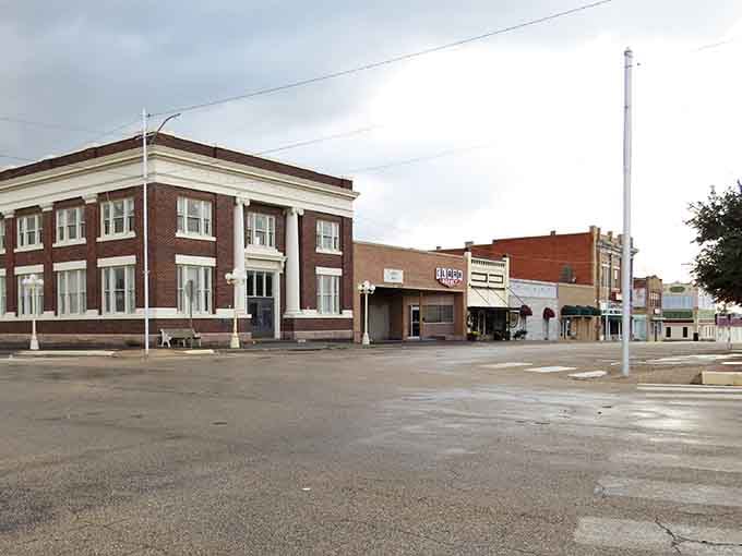 Sweetwater's wide downtown square sits quietly under a cloudy sky, the old bank building standing guard like it always has.