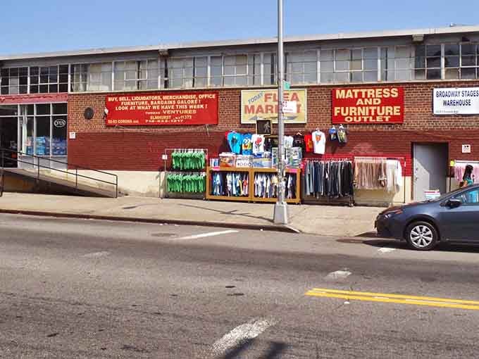 Bold red signs and sidewalk racks signal that serious bargain hunting starts right here in Elmhurst.