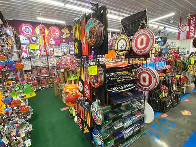 Ohio State flags, Steelers gear, and garden spinners packed together like the world's most enthusiastic sports-loving grandparent's garage.