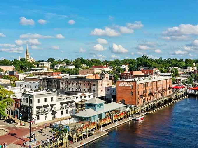 The historic riverfront and brick buildings create a coastal charm that rivals any New England harbor town.