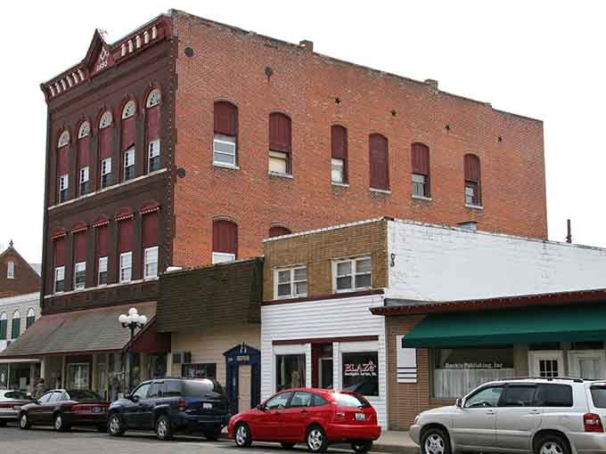 Decorative brickwork on this corner building shows the kind of attention to detail that makes old towns worth preserving and exploring.