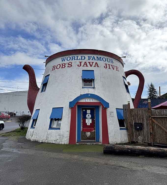 Clouds roll overhead, but nothing dims the cheerful charm of this giant teapot standing tall.