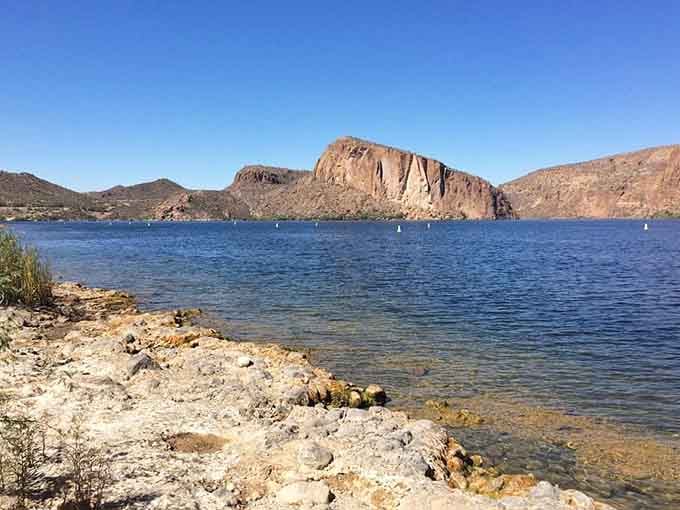 That massive cliff face rising above Canyon Lake's shoreline has been turning heads for millions of years.